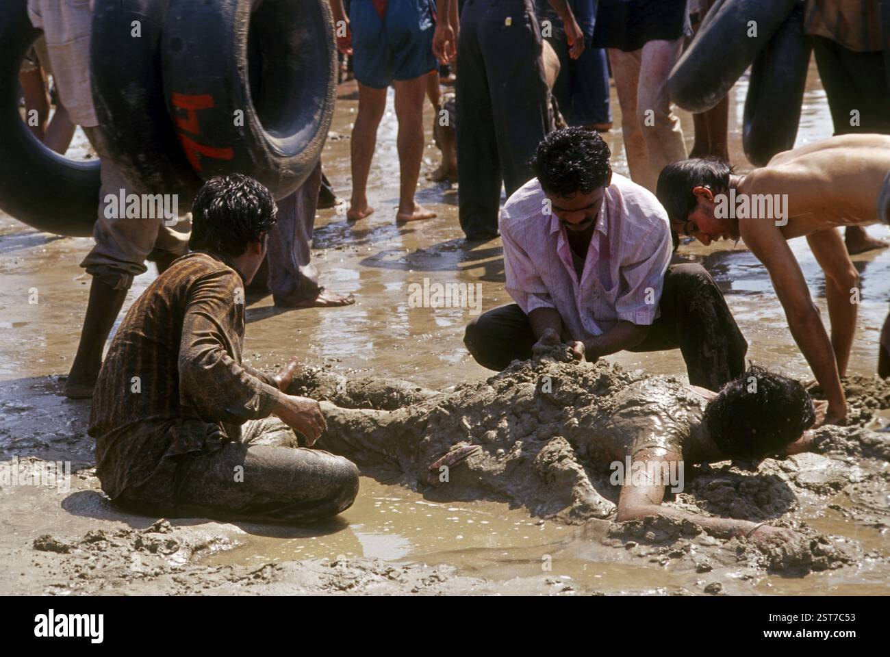 Mud bath, holi festival, india Stock Photo - Alamy