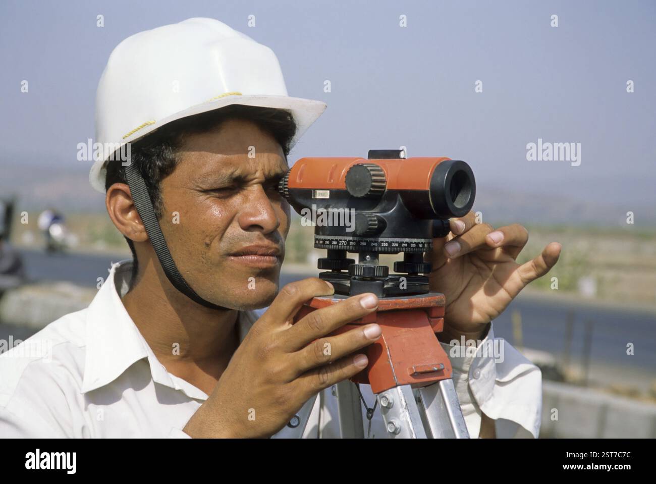 Engineer at road construction site, india Stock Photo - Alamy