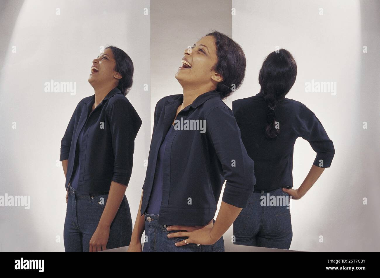 Indian woman, emotion laughter, woman laughing with two mirror ...