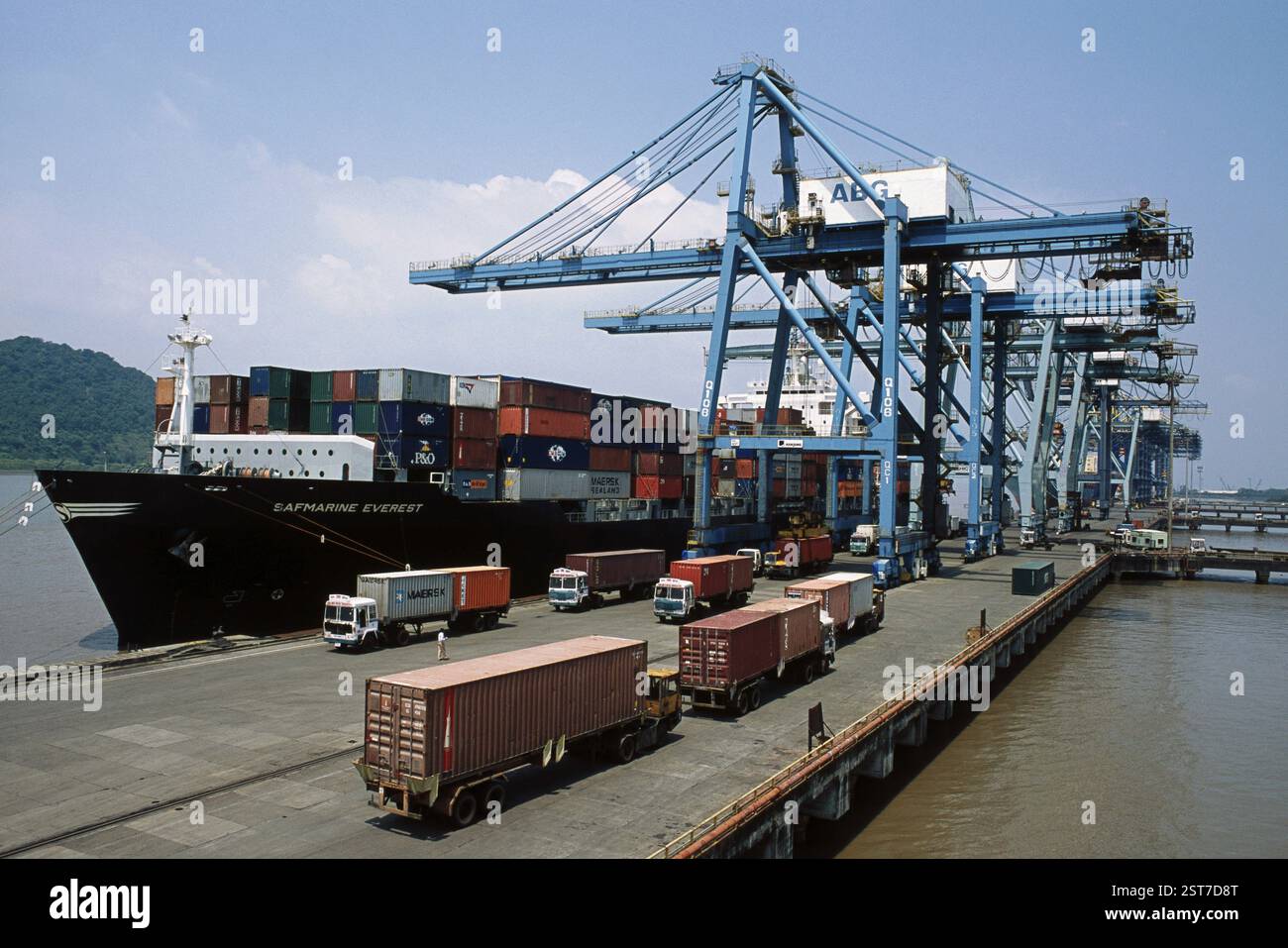 Containers loading at port, nava seva, india Stock Photo - Alamy