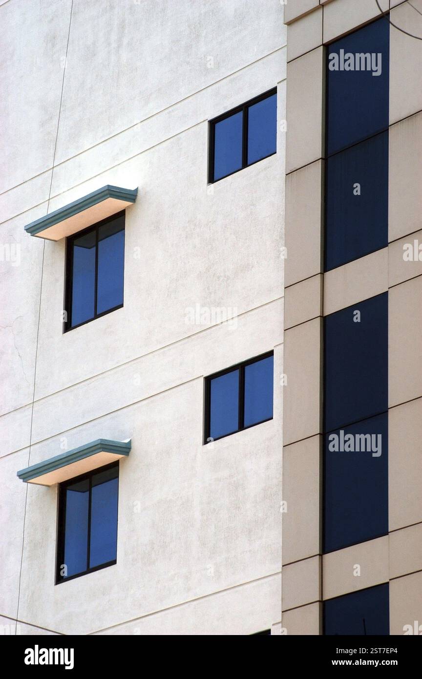 NR Chambers, a modern commercial complex with blue glass windows in ...