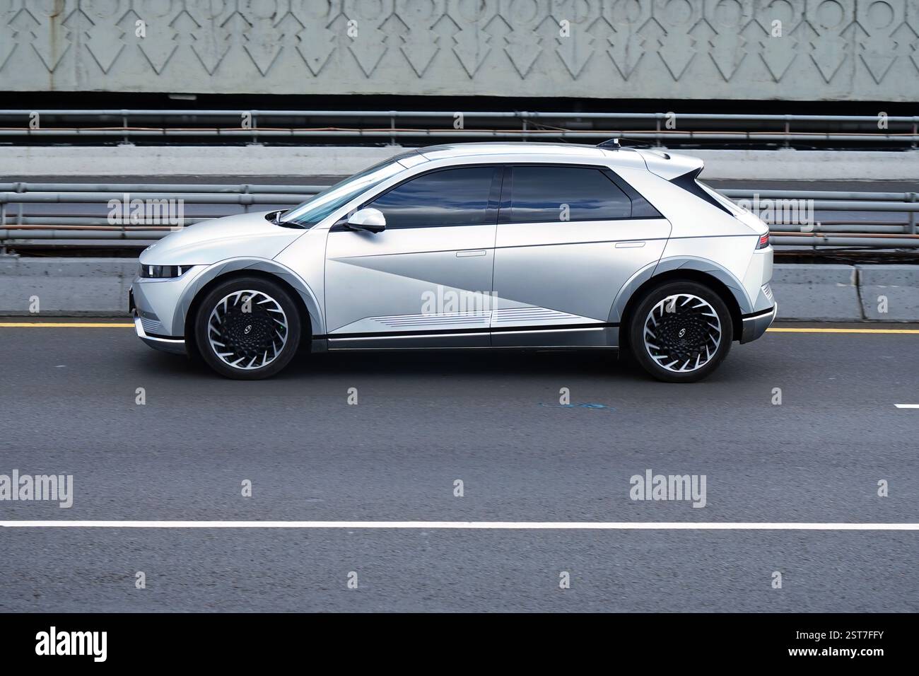 electric car, Hyundai Ioniq 5, white color on the highway, Jakarta ...