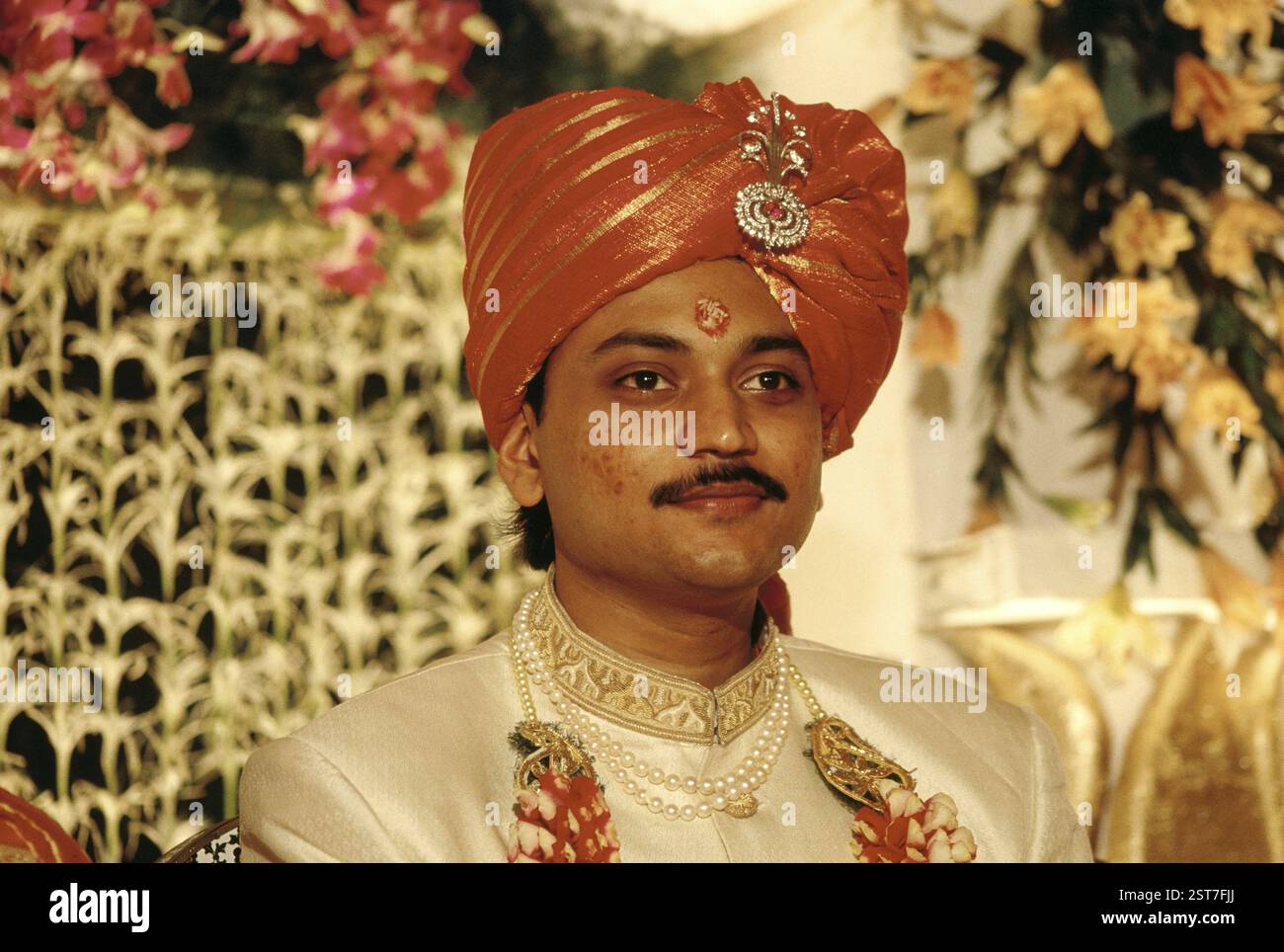 Bride wearing turban in marriage ceremony MR Stock Photo - Alamy