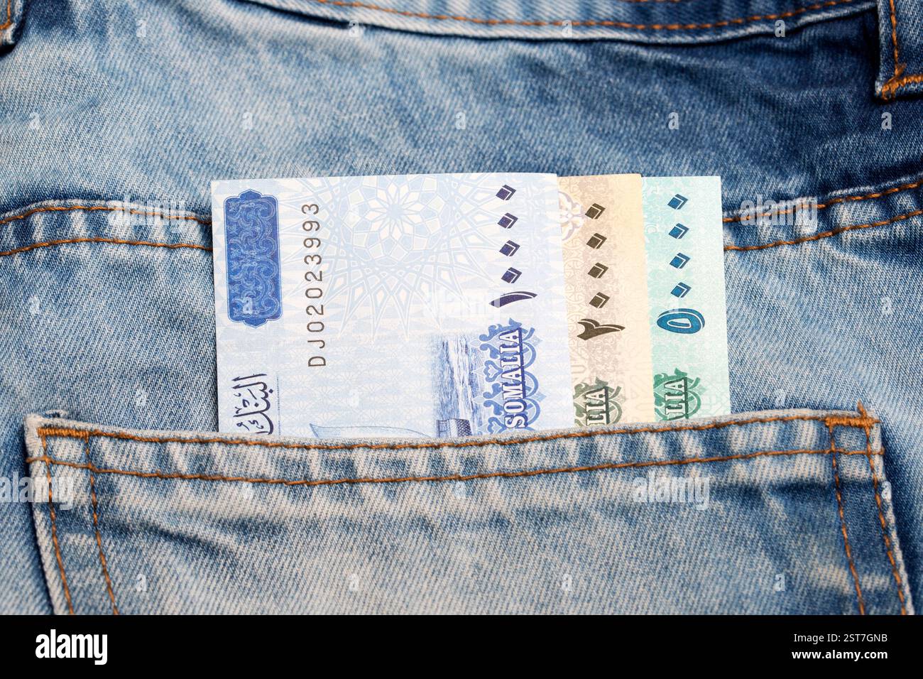 Somali money - Shilling in the pocket of blue jeans Stock Photo - Alamy