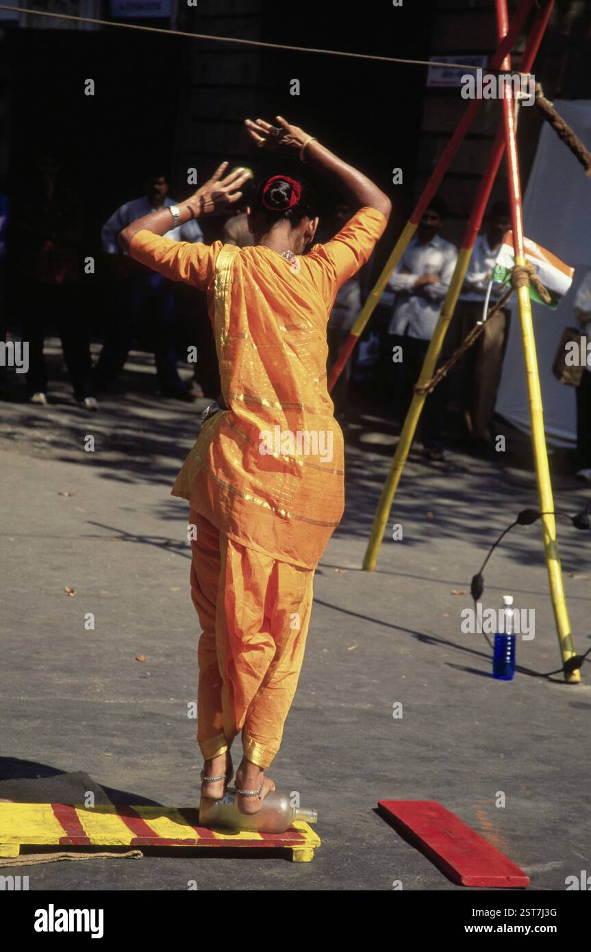 Balancing on bottle dombari show, Kala Ghoda, Bombay Mumbai ...