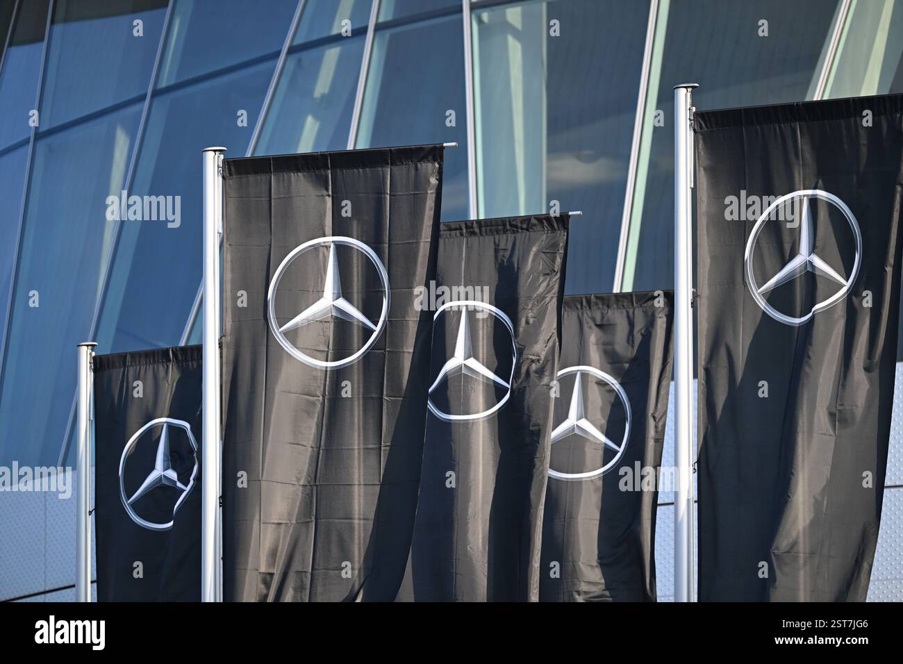 Stuttgart, Germany. 17th Feb, 2025. Flags with the logo of the vehicle ...