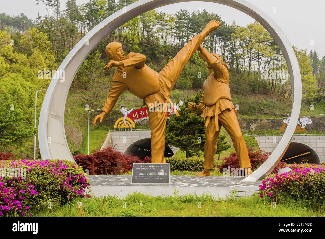 Muju, South Korea, May 1, 2019: Bronze statue of two men engaged in ...