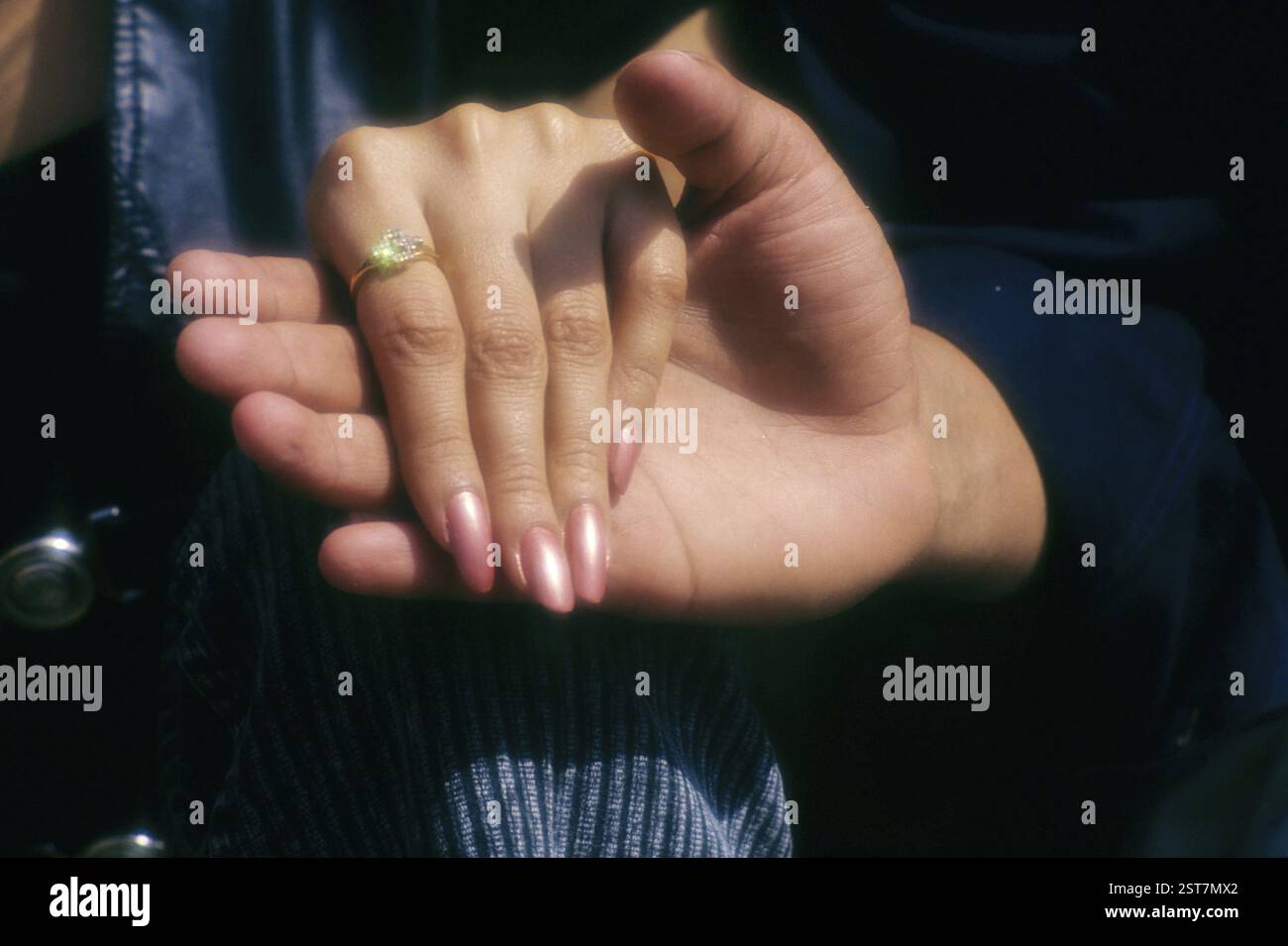 Woman salutes hand holding hi-res stock photography and images - Alamy
