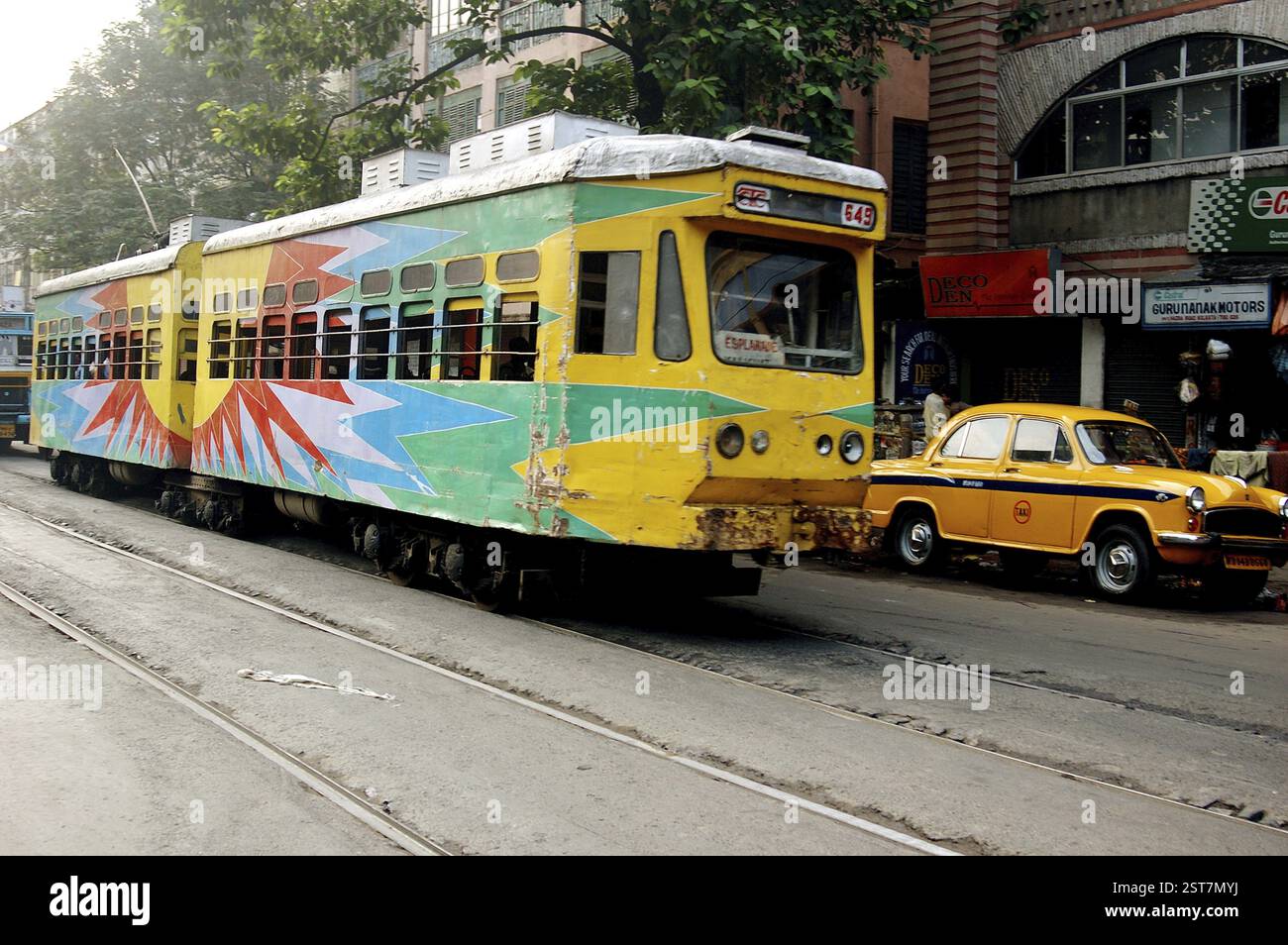 Colorful painted tram on streets of Calcutta, West Bengal, India, Asia ...