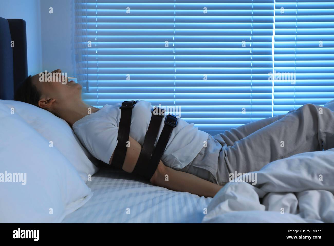Woman in sleepwalking condition screaming on bed Stock Photo - Alamy