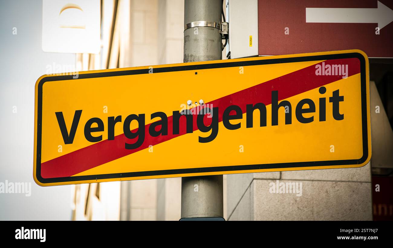 An image with a signpost pointing in two different directions in German ...