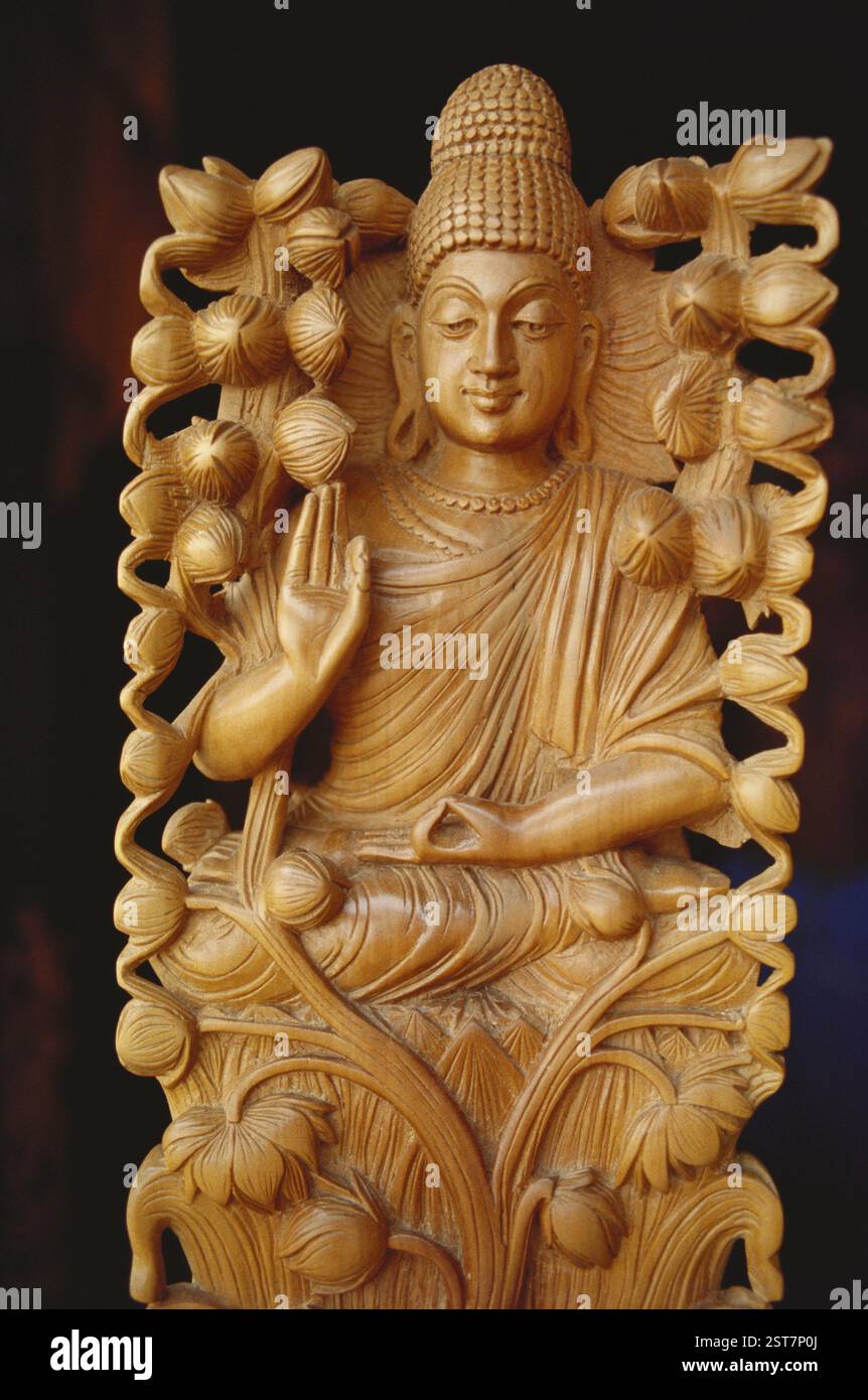 Well Executed sandal wood Figures of Lord Buddha Stock Photo - Alamy