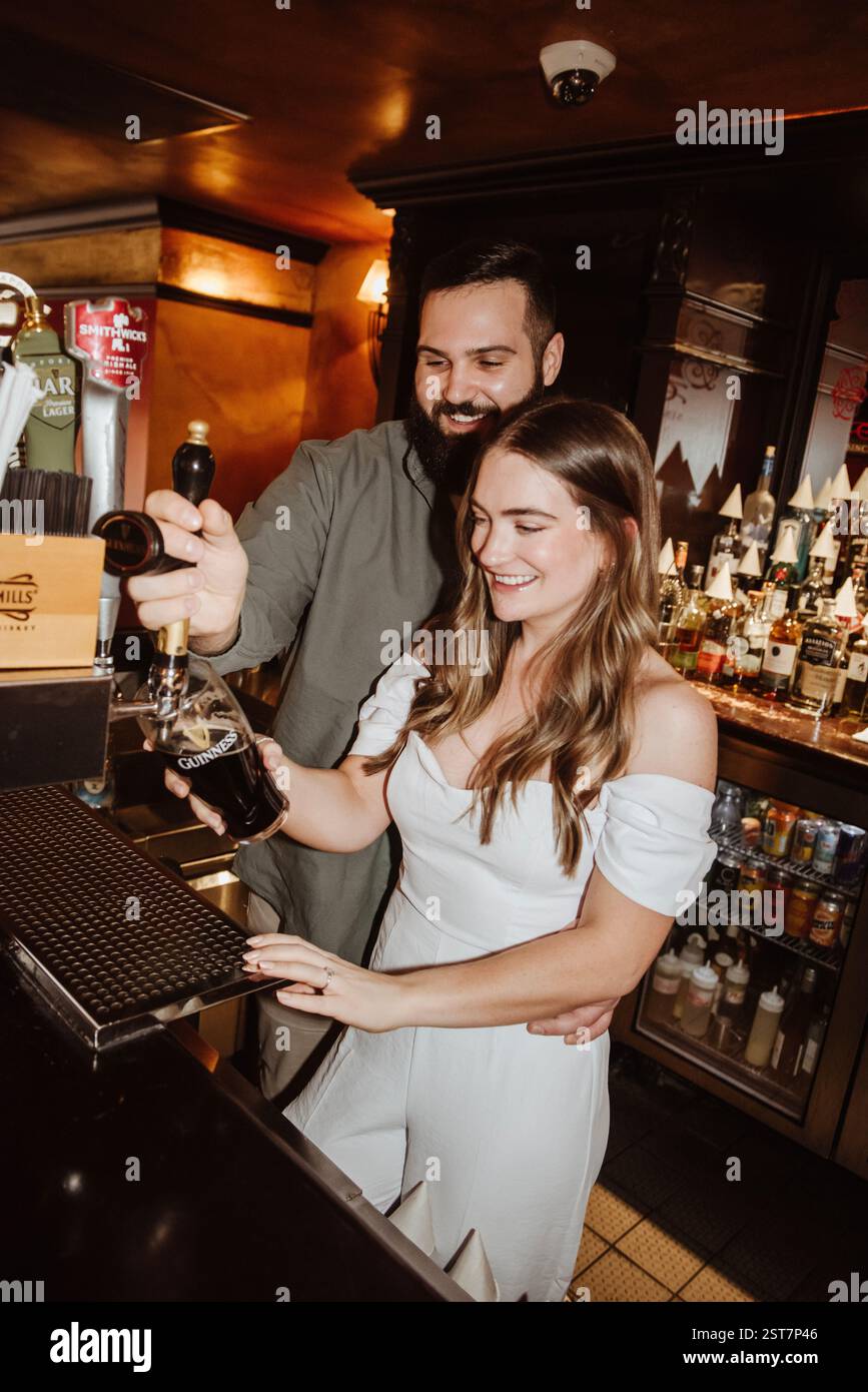 Romantic party vibe engagement photos inside an Irish Pub Stock Photo ...