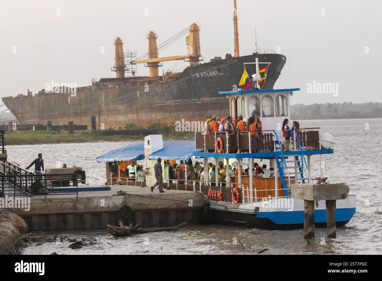 Boats on the Magdalena River: abandoned vessel, tugboat, tourist ferry ...