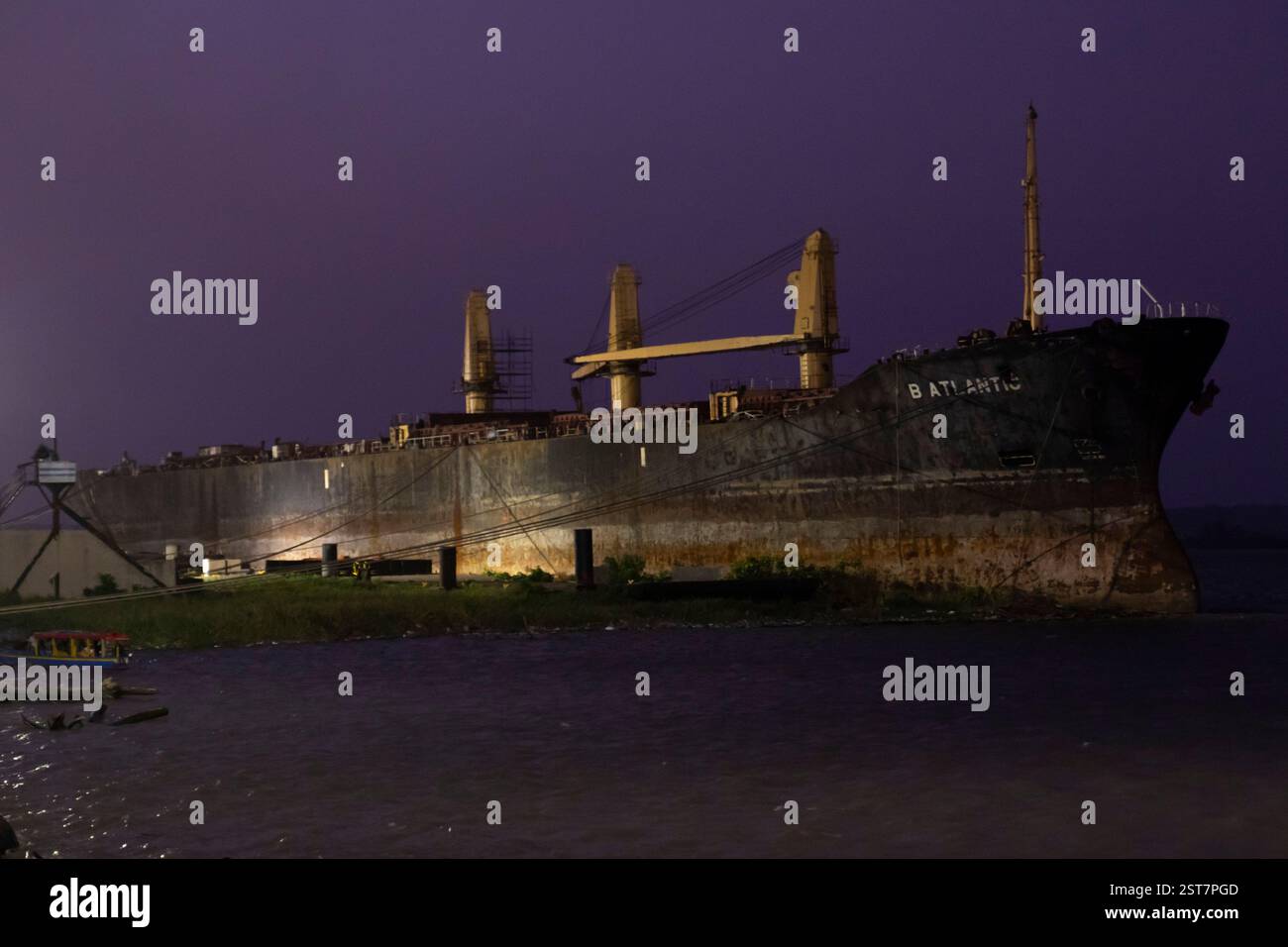 Boats on the Magdalena River: abandoned vessel, tugboat, tourist ferry ...