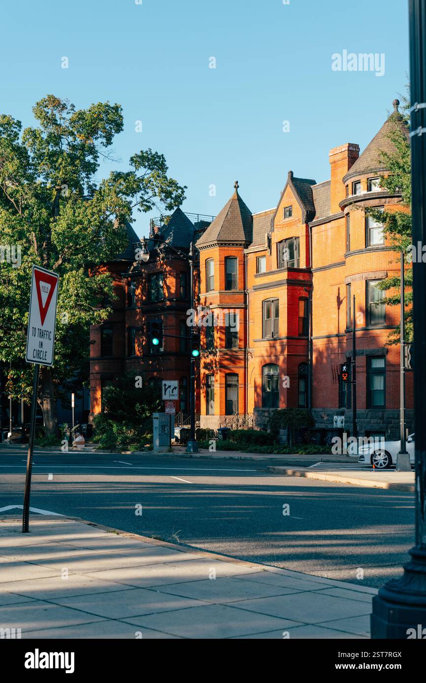 Charming red brick buildings with intricate architecture stand tall ...