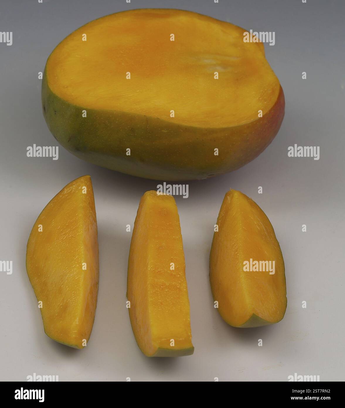 Fruits, Mango and Slices Stock Photo - Alamy