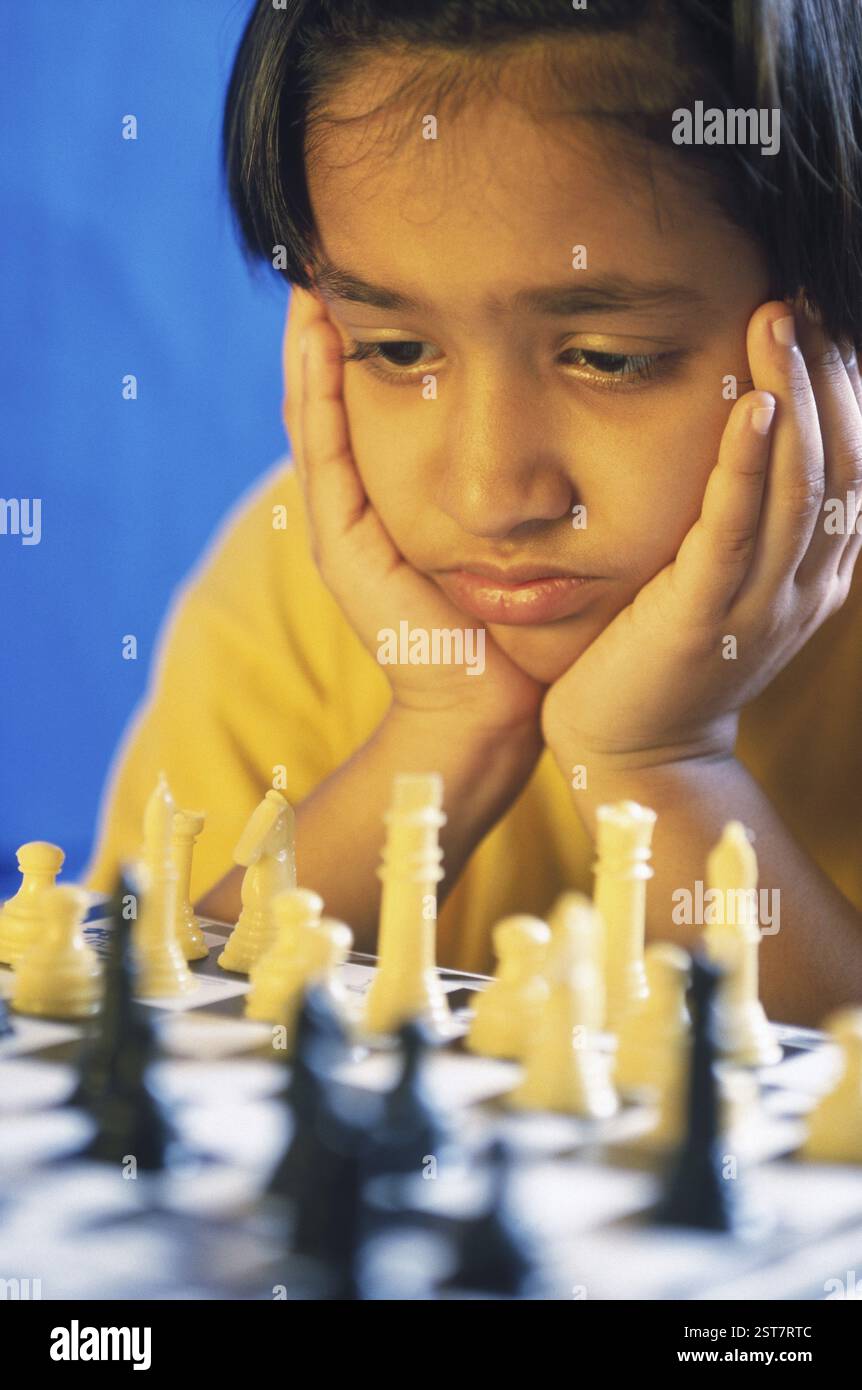South Asian Indian girl playing chess MR#201 Stock Photo - Alamy
