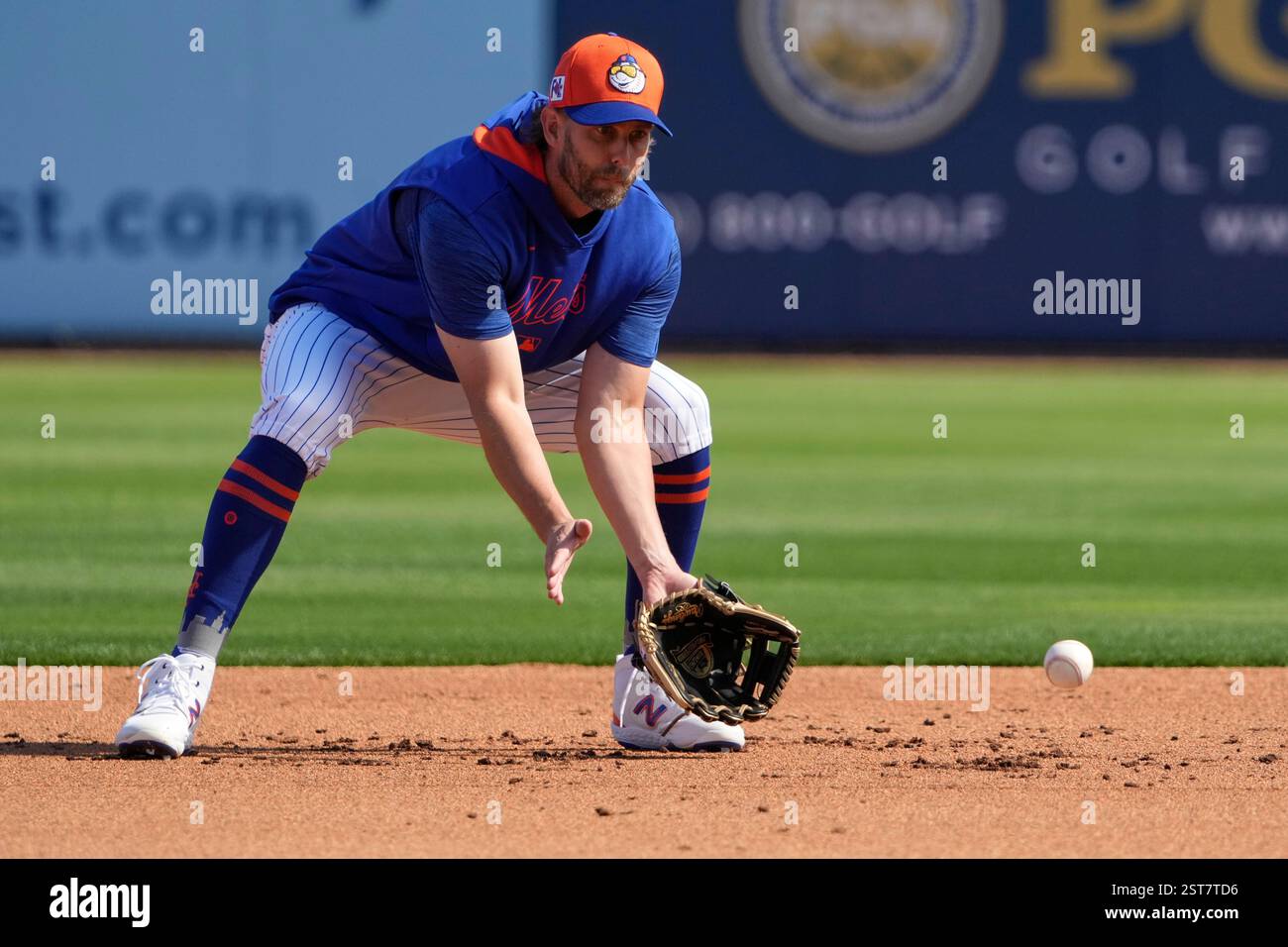 New York Mets infielder Jeff McNeil handles a grounder during a spring ...