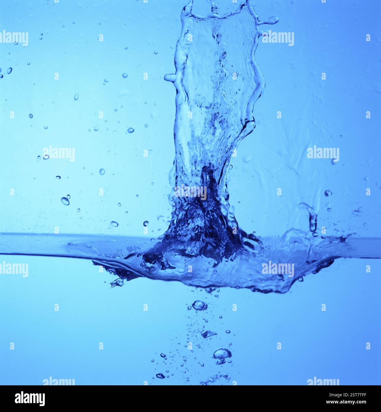 Concept, Water drop splash with blue background Stock Photo - Alamy