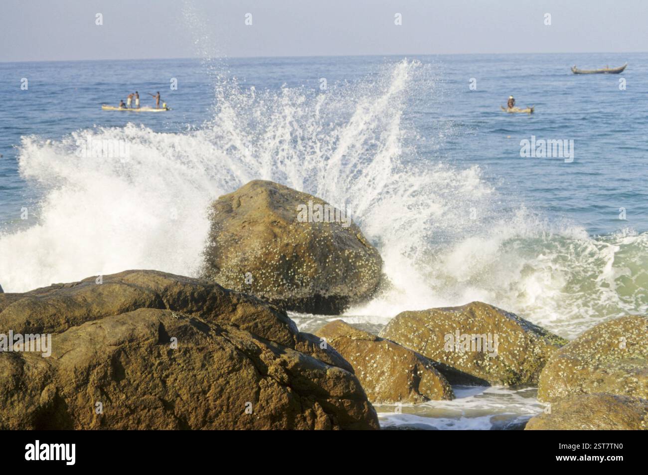 Ocean waves striking rock, kovalam beach, kerala, india Stock Photo - Alamy