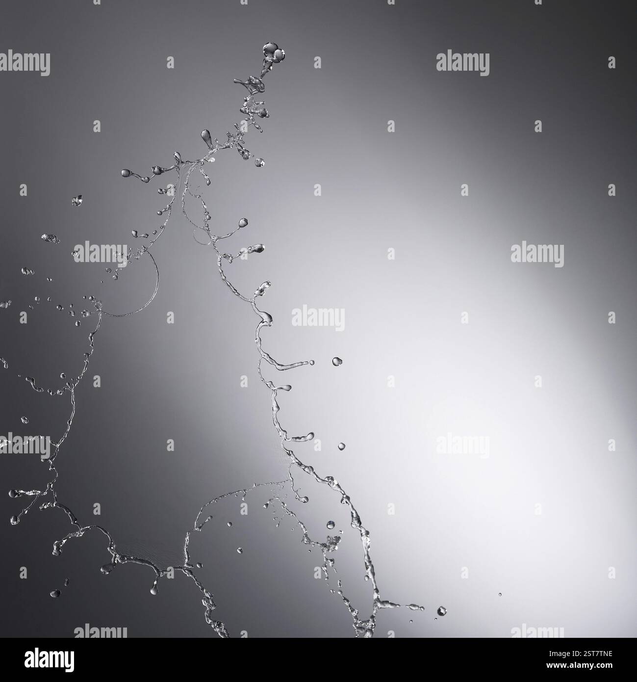 Water drop splash with grey background Stock Photo - Alamy