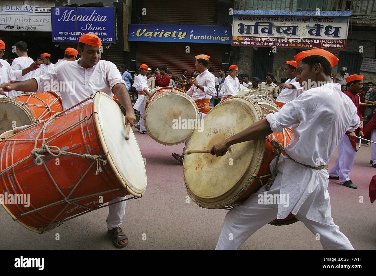 Devotees of Lord Ganesh, the elephant headed God, playing musical ...