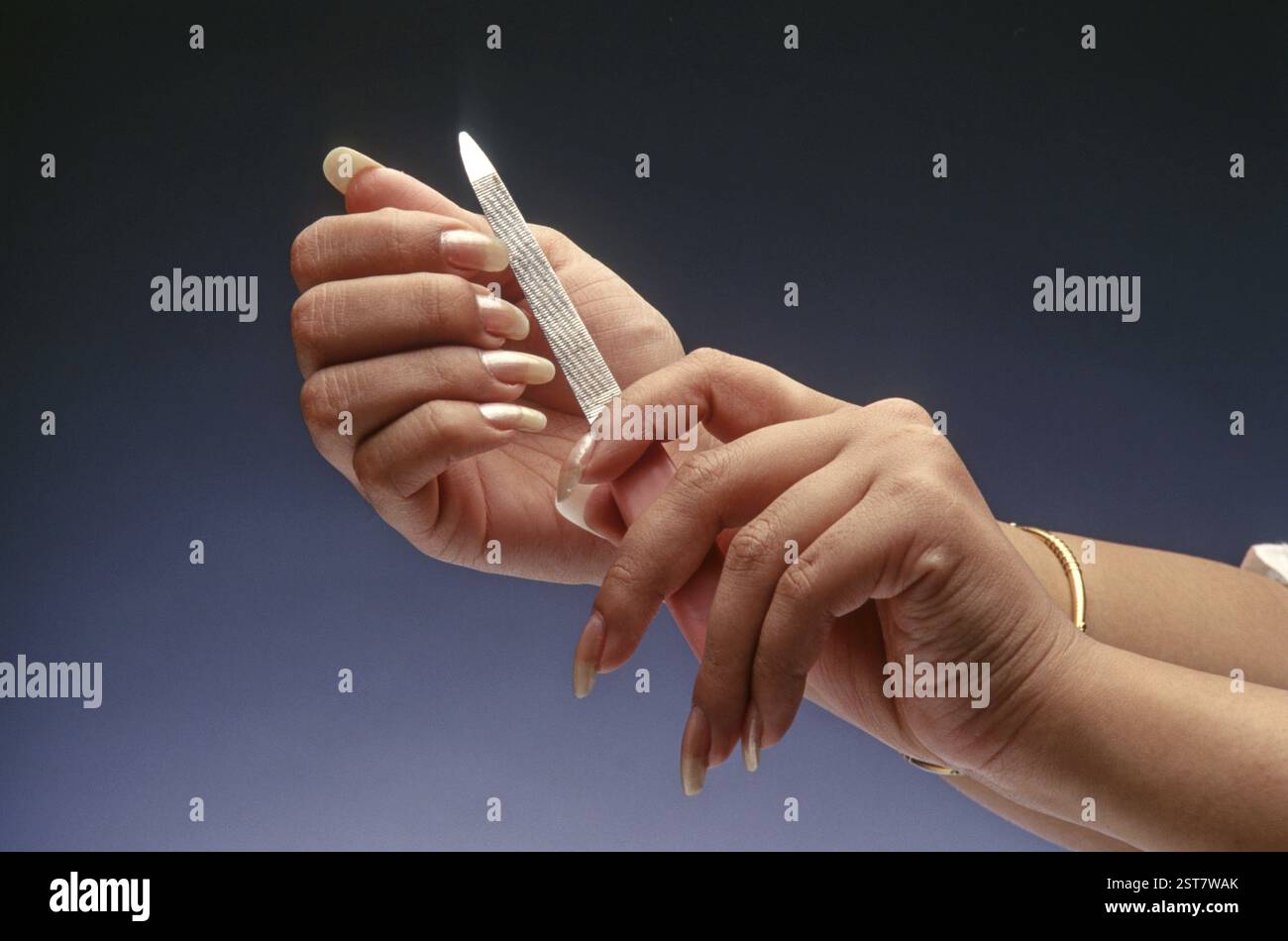 Man woman looking nail hi-res stock photography and images - Alamy