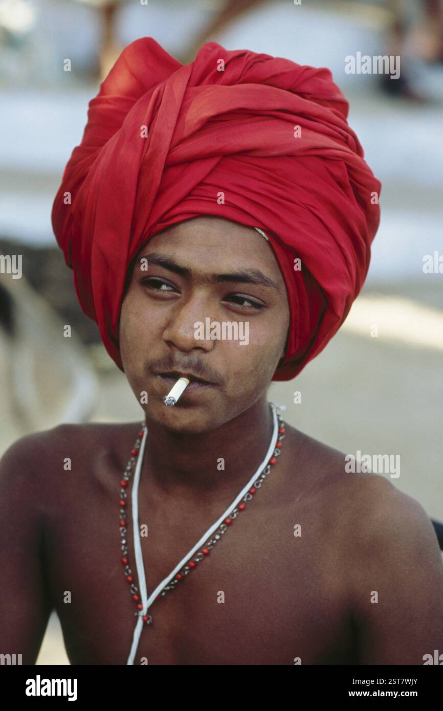 Man smoking cigarettes, kumbh fair, ujjain, madhya pradesh, india 2004 ...