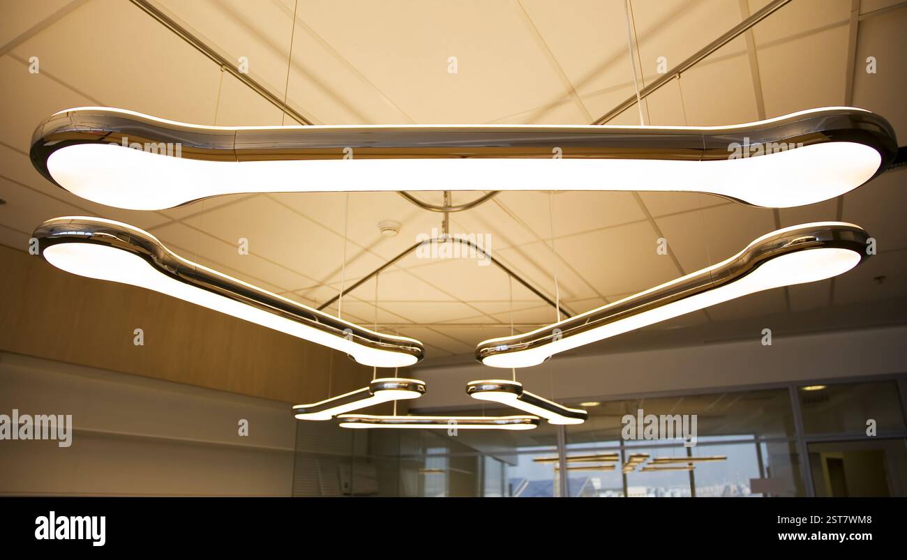 Overhead fluorescent lights illuminate hi-res stock photography and ...