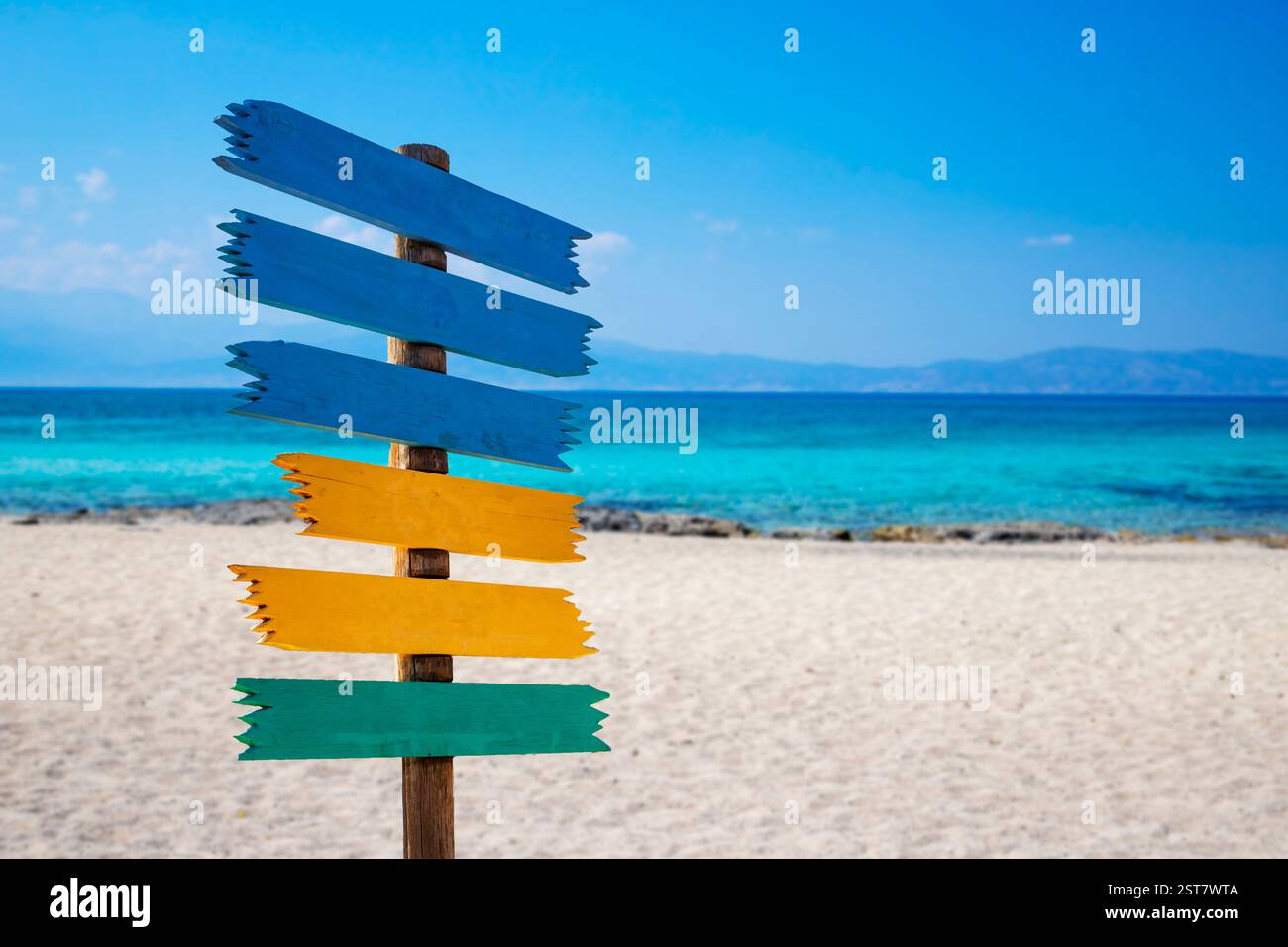 Wooden signboard on the beach. Empty wooden signboard on tropical paradise beach. Travel and ...