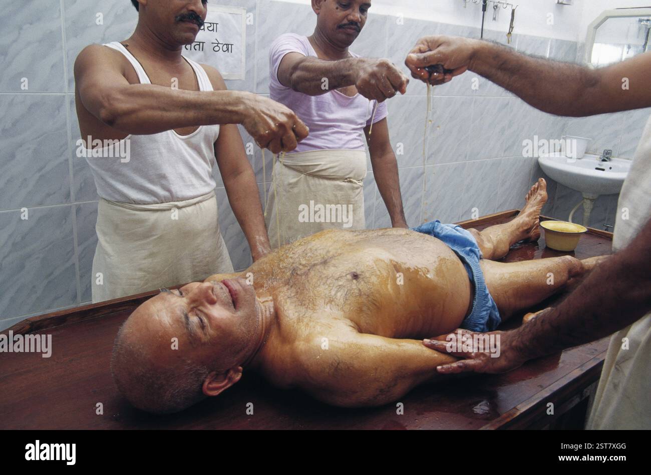 Panchakarma, Pizichil, Ayurvedic Medicated oil treatment Stock Photo ...