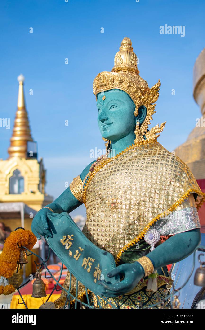 Devotional statue at Wat Saket or The Golden Mount Temple, Bangkok ...