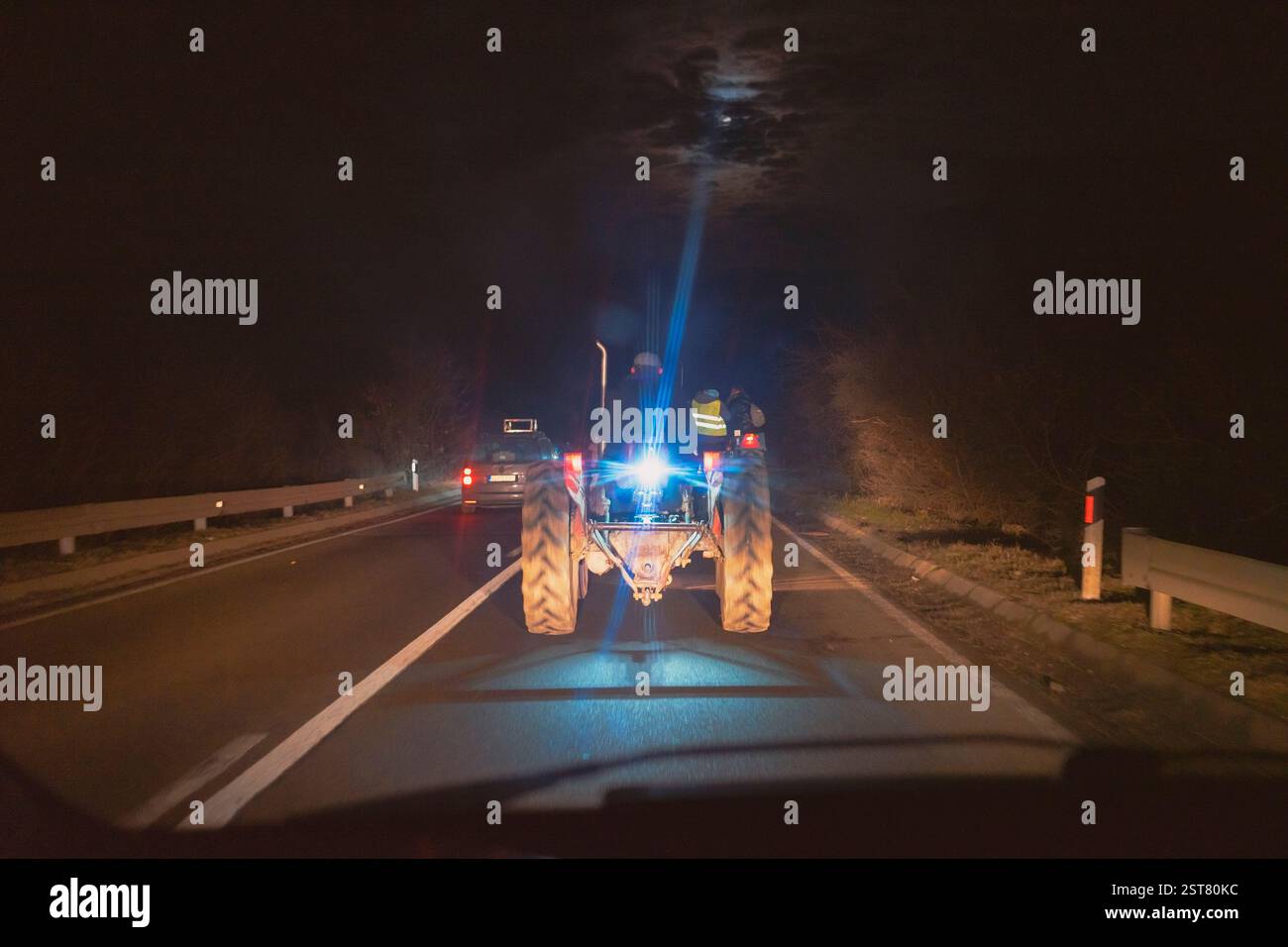 Woman driving night in slow hi-res stock photography and images - Alamy