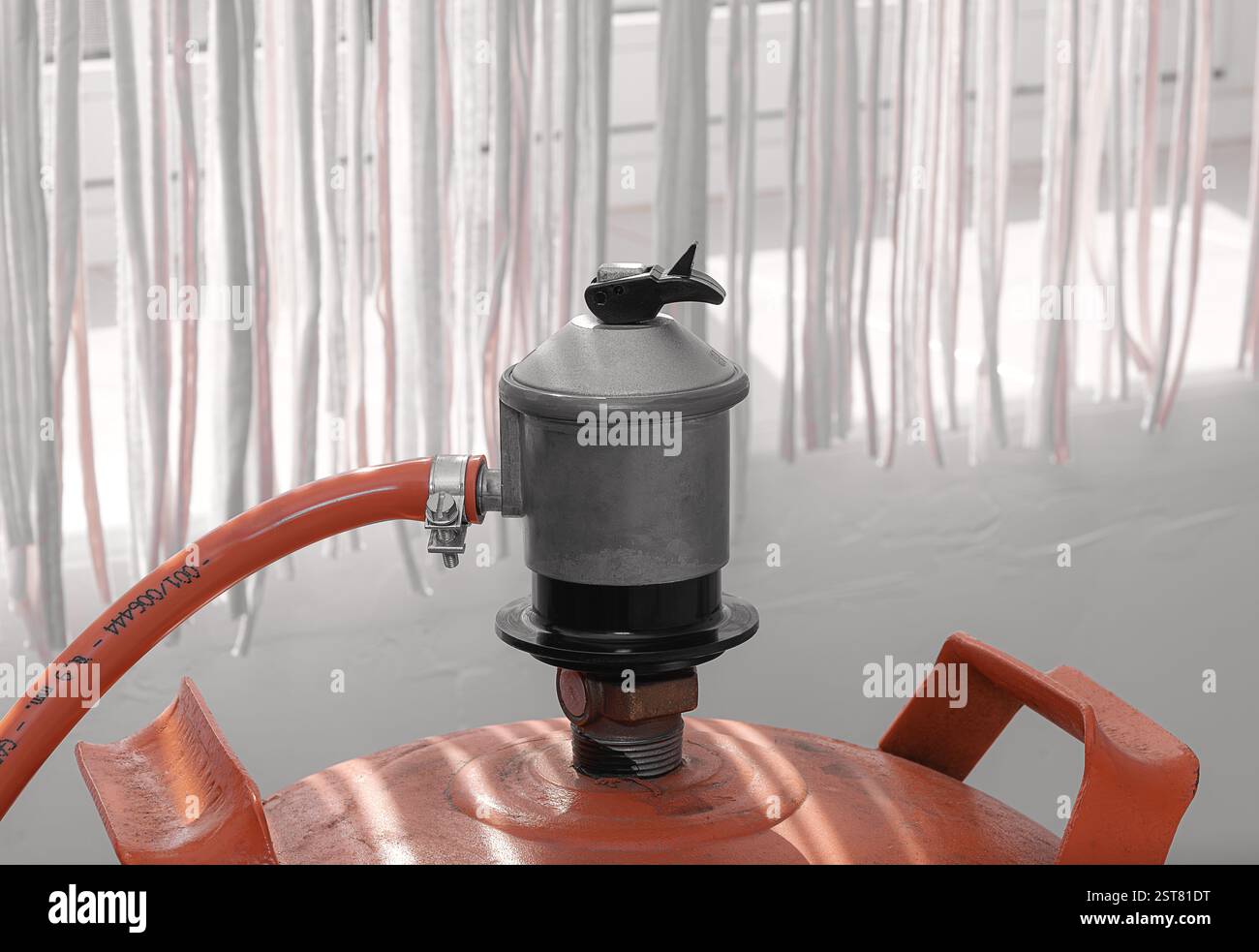Butane gas cylinder regulator with flexible tube and meta clamp Stock ...