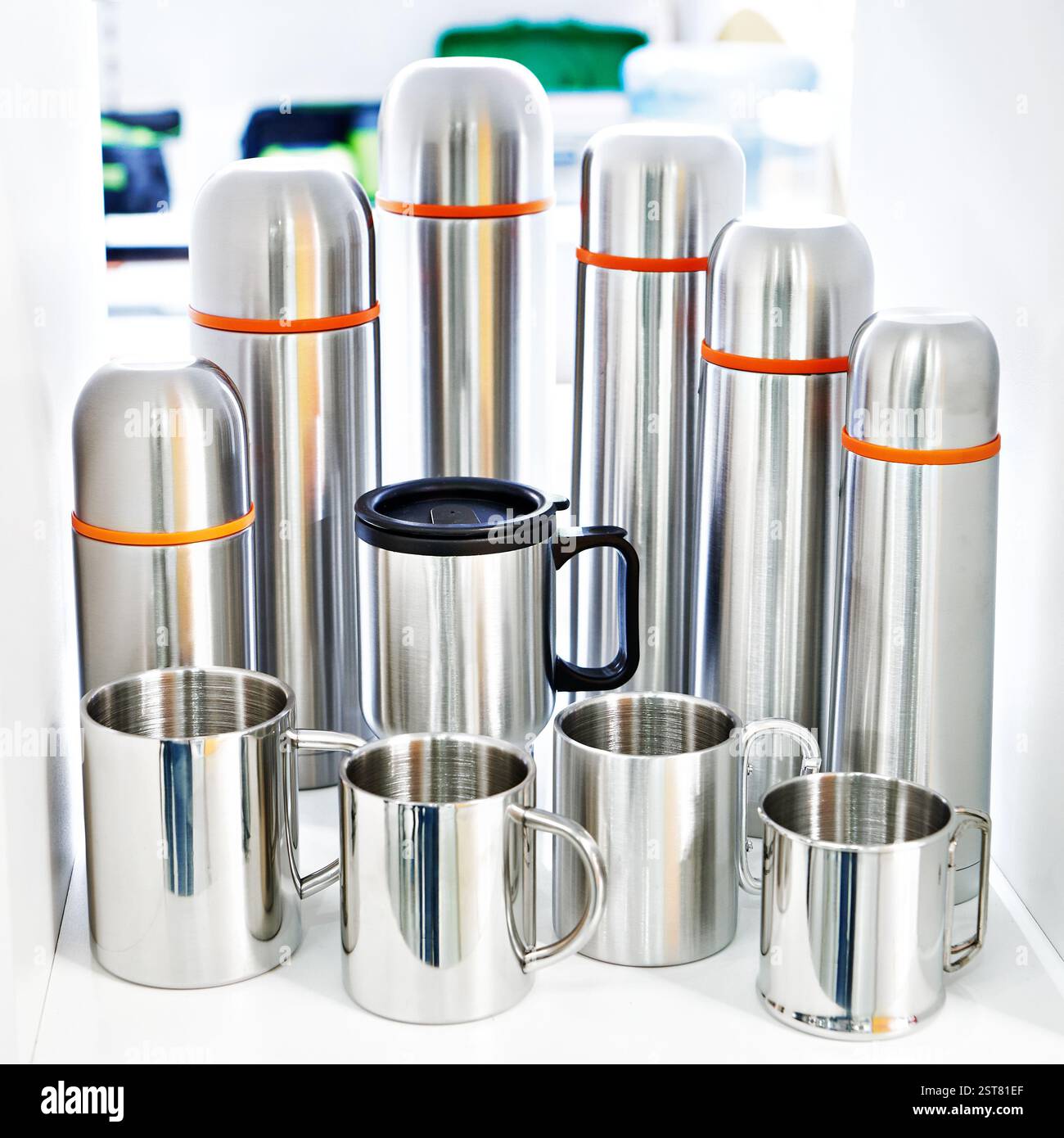Thermos and mugs metal stainless steel in the store Stock Photo - Alamy