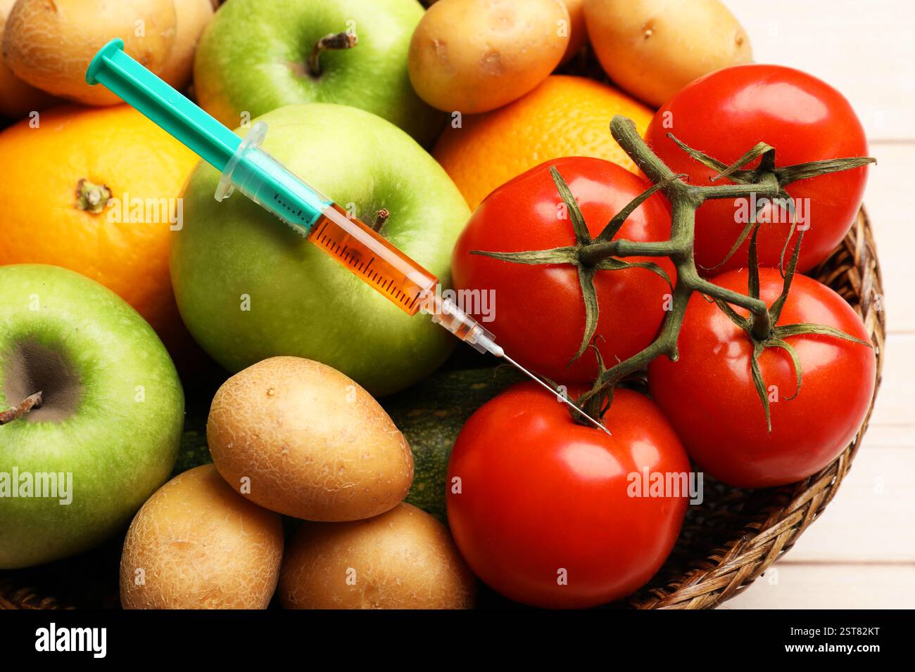 Gmo concept tomato syringe hi-res stock photography and images - Alamy