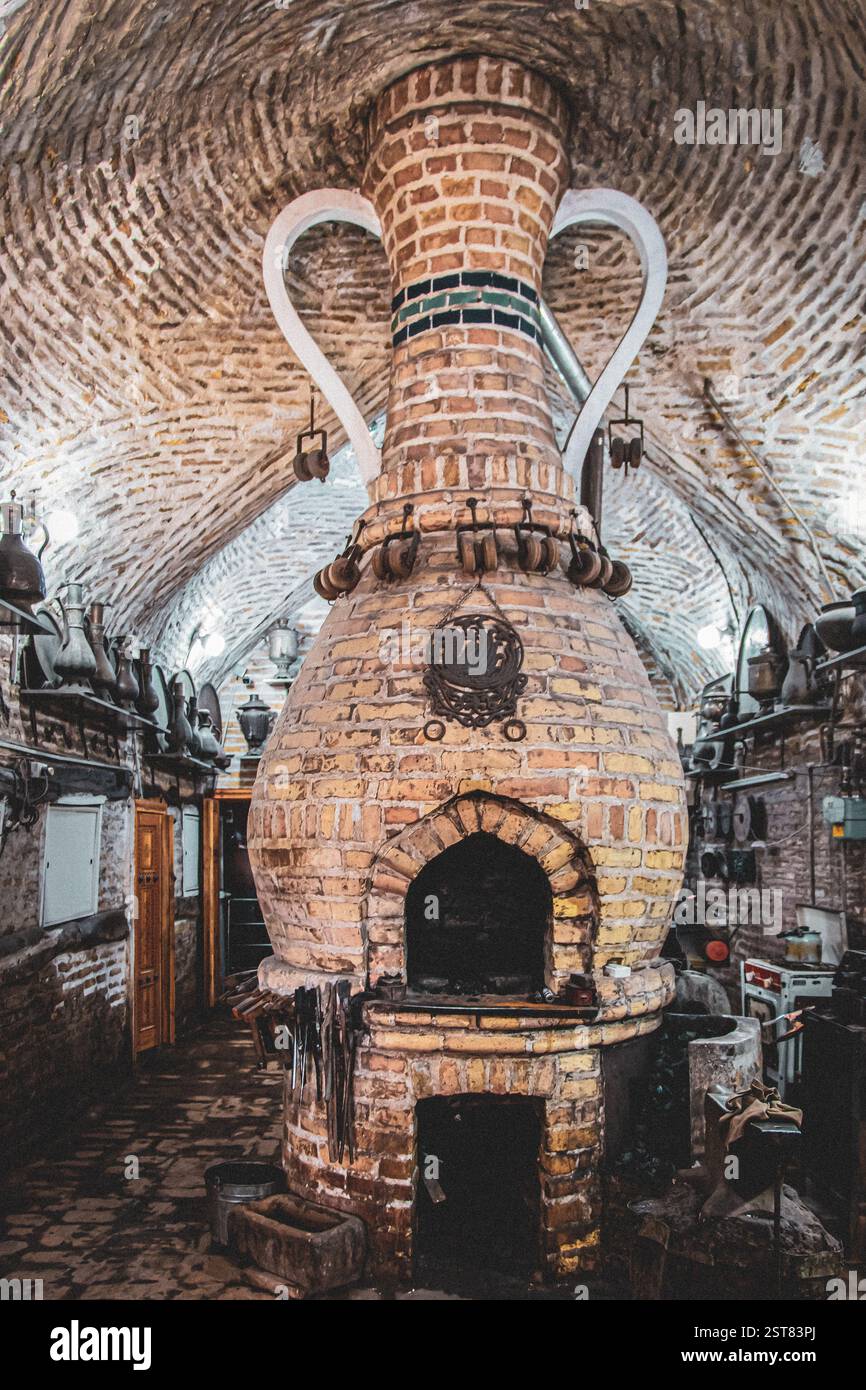 Rustic Brick Furnace in a Traditional Workshop Stock Photo - Alamy