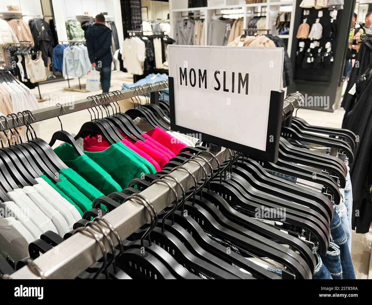 Lviv, Ukraine - February 16, 2025: Mom slim. Clothing rack displaying ...