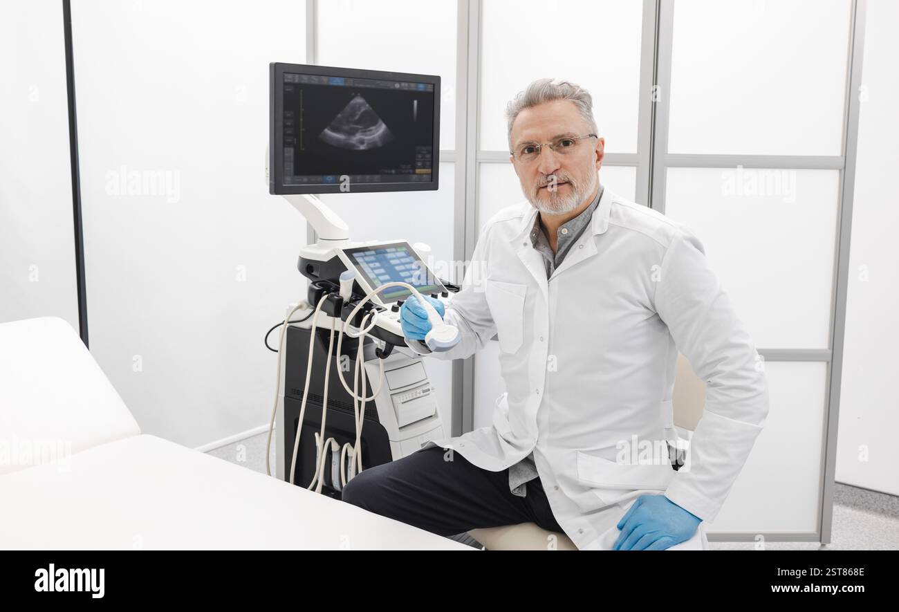 Portrait of cardiac sonographer in diagnostic office with modern equipment and high-frequency ...