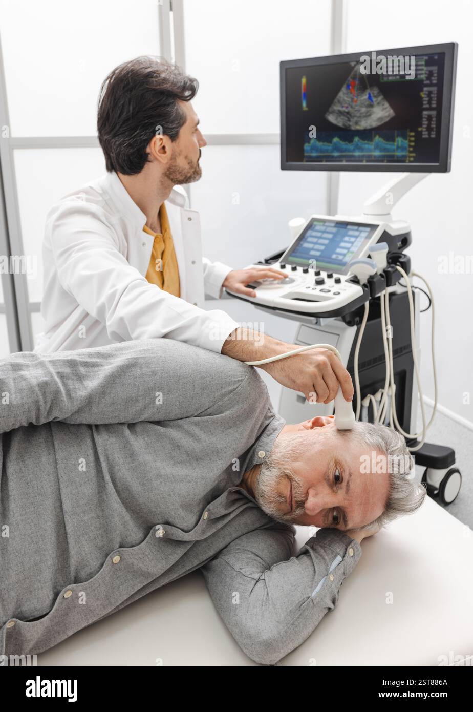 Sonographic examination of adult brain in medical facility using ...