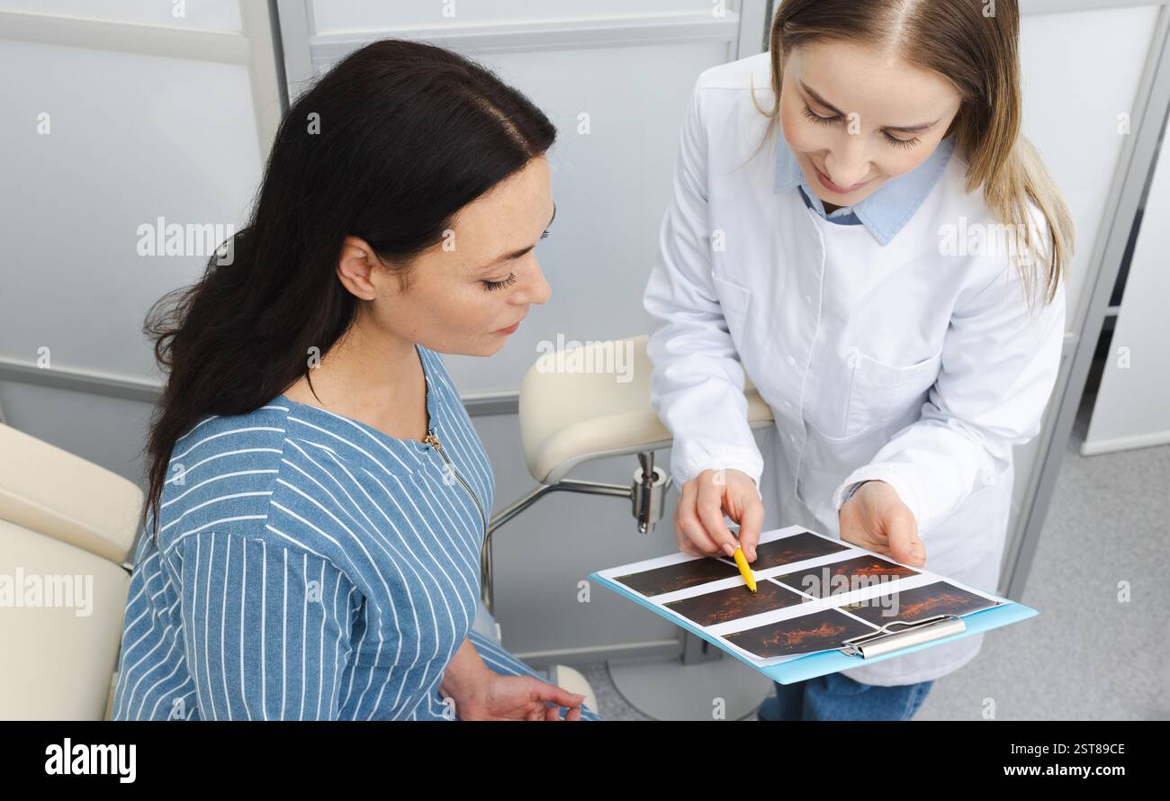Woman patient and gynecologist analyzing folliculometry results, growth ...