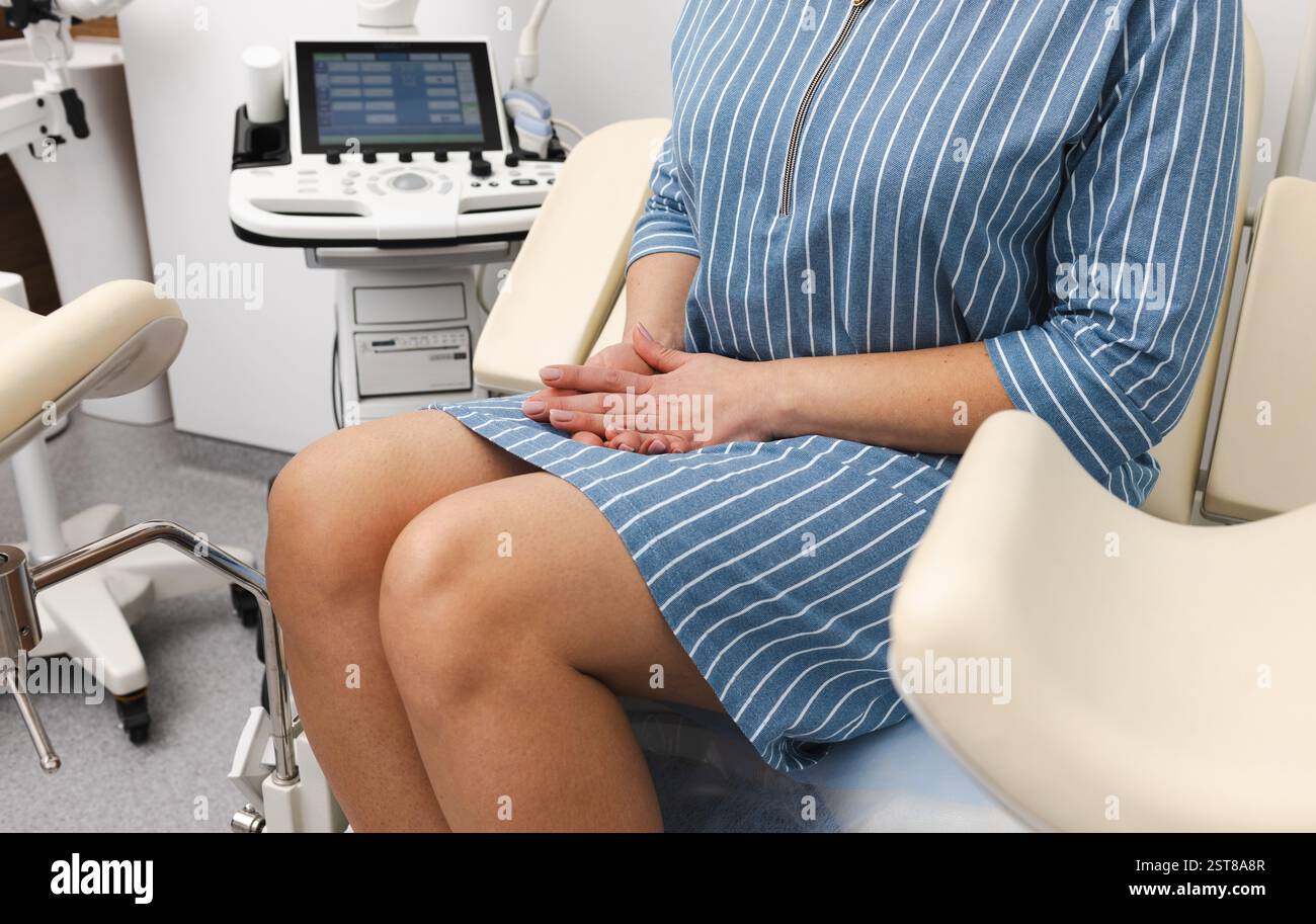 Gynecological check-up for woman sitting on examination gynecology ...