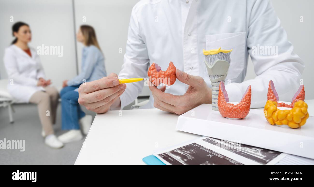 Endocrinologist Checking Thyroid Gland Of Woman Patient By Palpation Female Has Enlarged