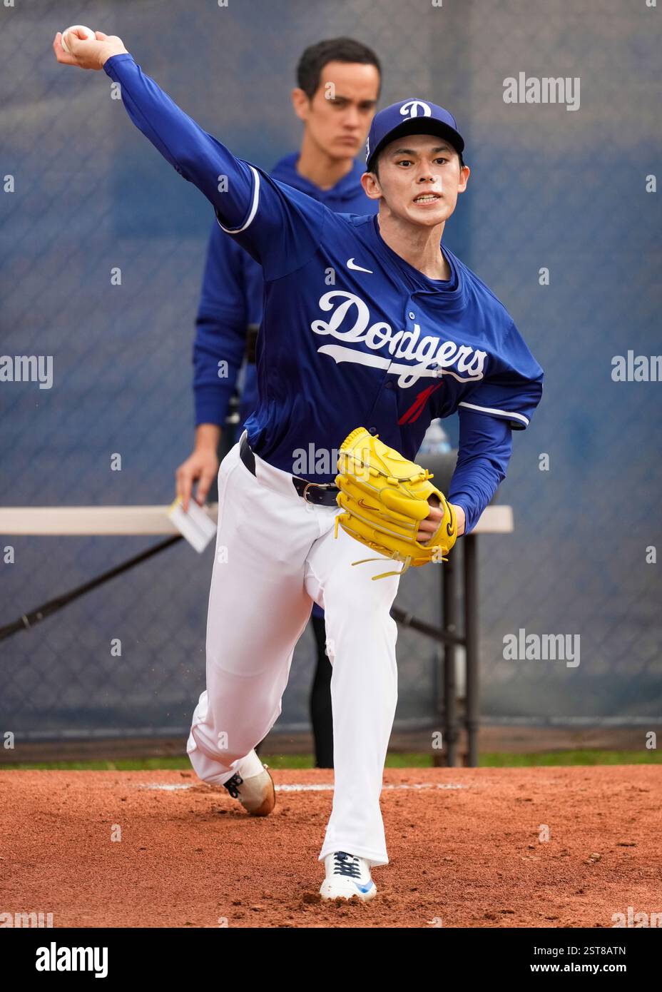 Los Angeles Dodgers pitcher Roki Sasaki (11) throws in the bullpen ...