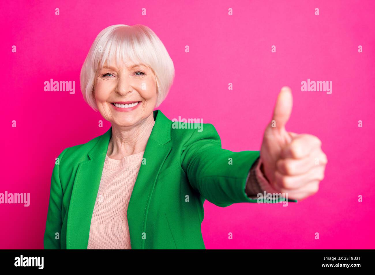 Woman wearing blue jacket showing hi-res stock photography and images ...