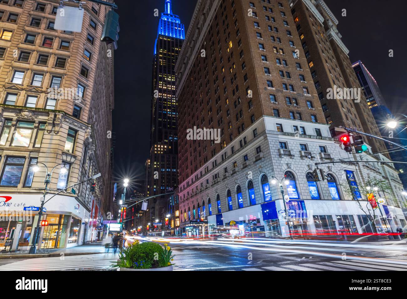 Light trails from car headlights at busy intersection near the Empire ...
