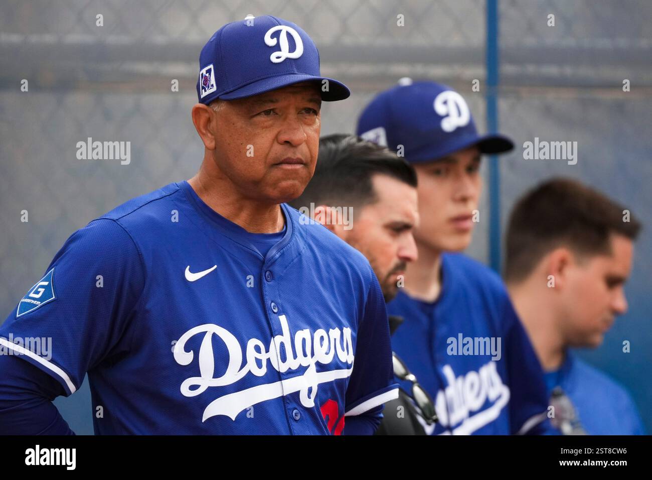 Los Angeles Dodgers manager Dave Roberts, left, watches as pitchers ...