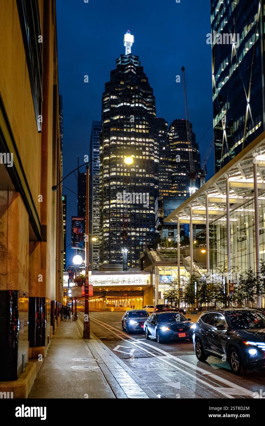 Urban streets of a night city life. Night City Street Building View ...