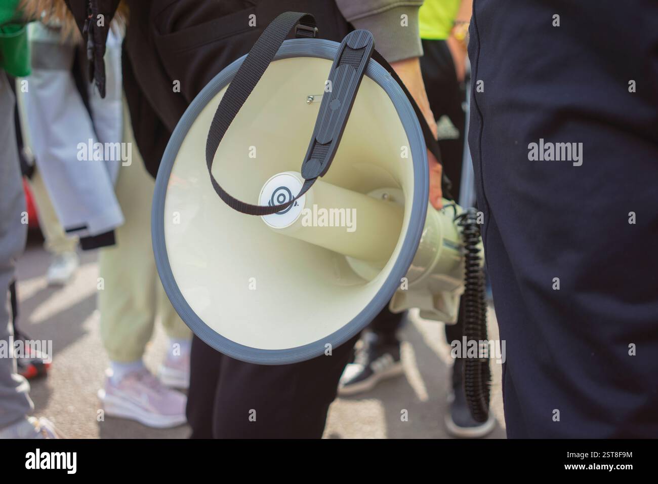Modern very loud megaphone in hand at protests, close up view Stock ...